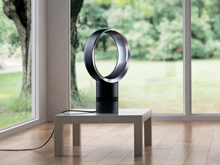 Who invented the bladeless fan and how does it work?